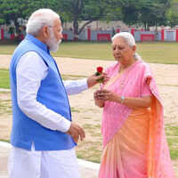 Narendra Modi in Banaras: BJP CM Yogi Adityanath welcomes PM with Red ...